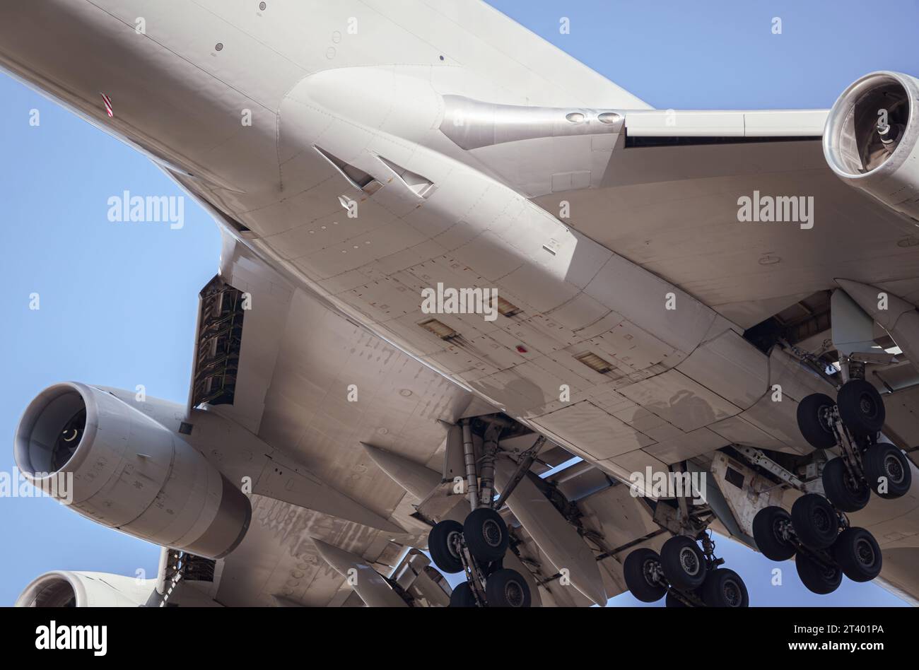 Close-up view of a cargo airplane's underside, taken from a low angle ...