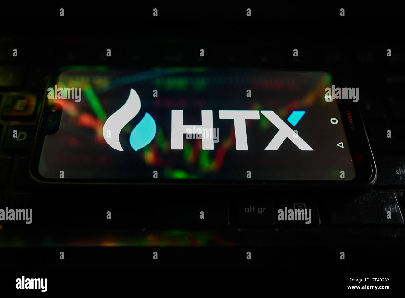 In this photo illustration, HTX logo is displayed on a smartphone with ...