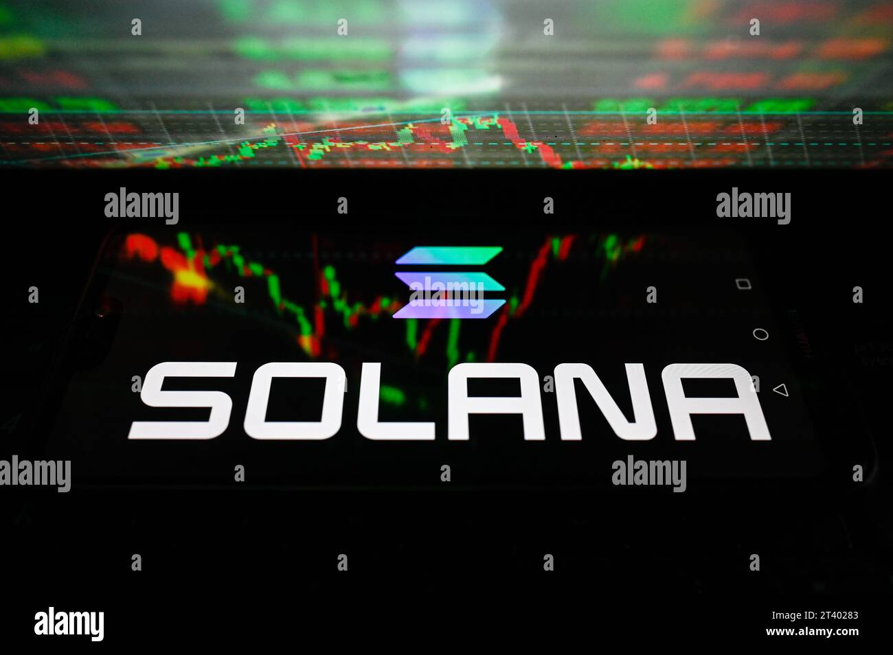 In this photo illustration, Solana logo is displayed on a smartphone ...