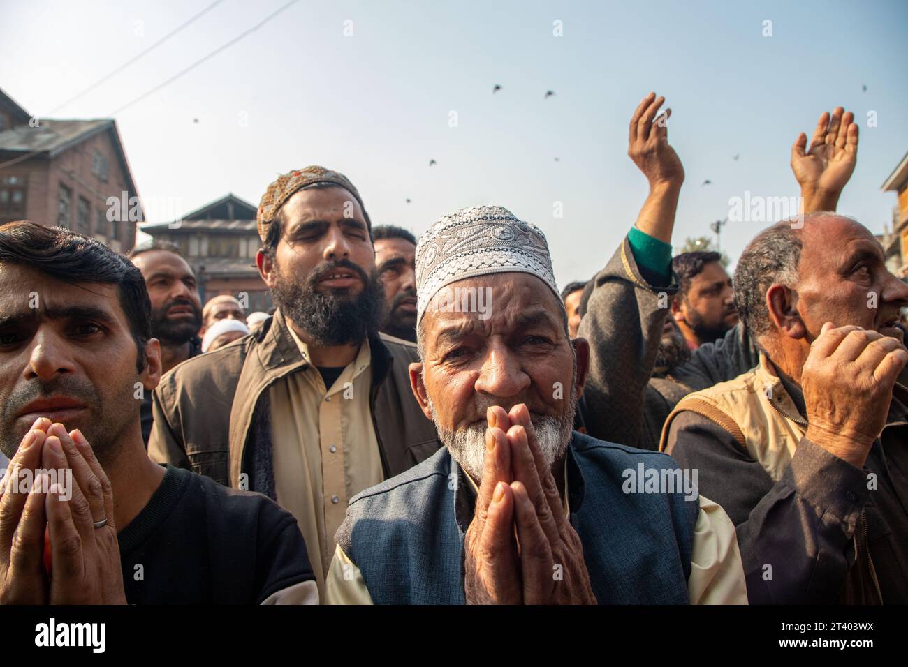 Srinagar, India. 27th Oct, 2023. Muslim devotees offer prayers as a ...