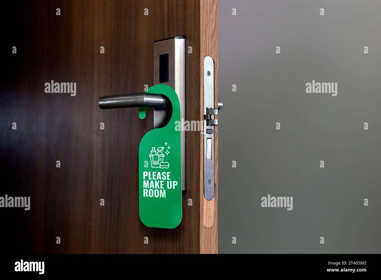 Please make up room. Sign hanging on doorknob. Hotel tag for bedroom ...