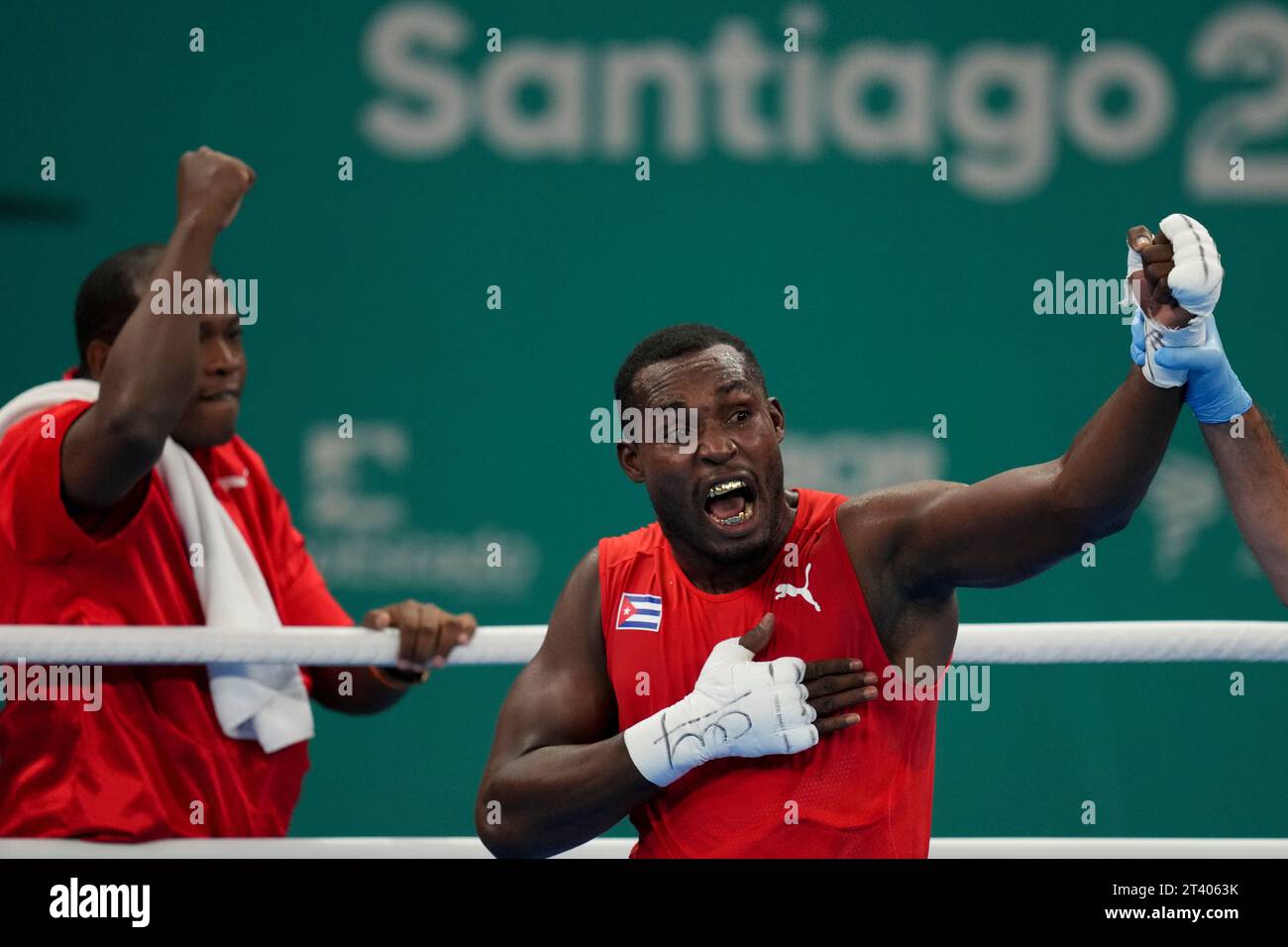 Cuba's Julio La Cruz celebrates beating Brazil's Keno Machado in the ...