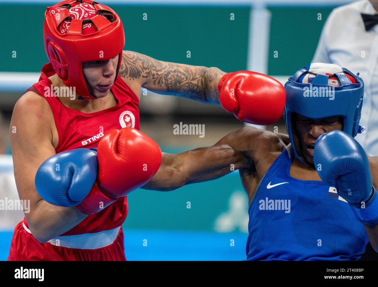 Santiago, Chile. 27th Oct, 2023. Canadian boxer Tammara Thibeault, left ...