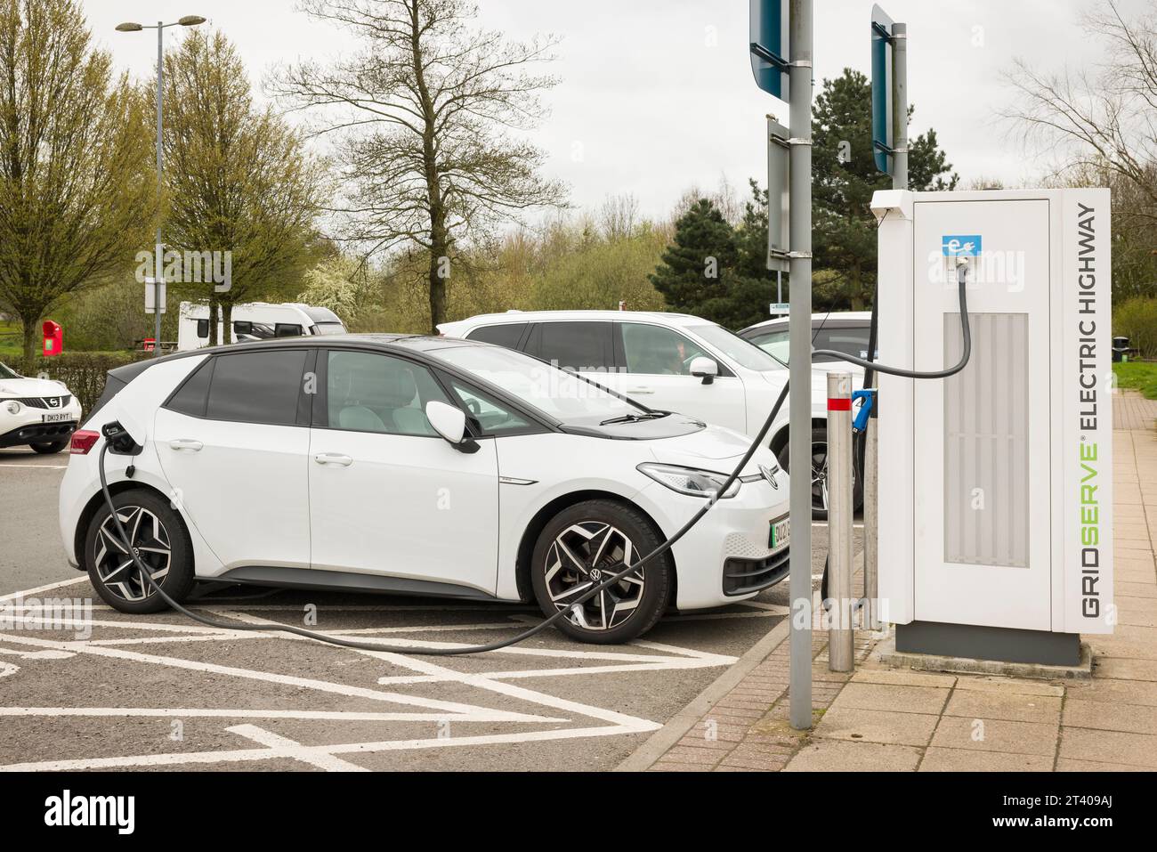 YORKSHIRE, UK - April 16, 2023. VW ID.3 electric car EV car refuelling at an electric car ...