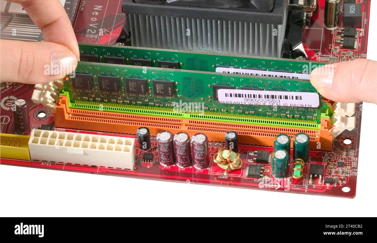 installing RAM memory into computer motherboard Stock Photo - Alamy installing RAM memory into computer motherboard Stock Photo - Alamy