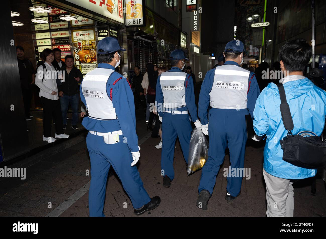 Tokyo, Japan. 27th Oct, 2023. Members of Shibuya Security Patrol, with ...