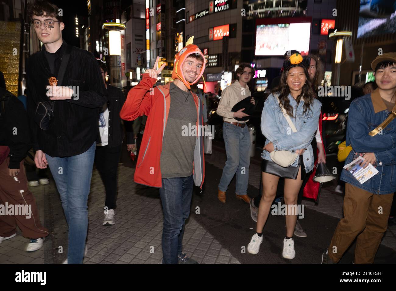 Tokyo, Japan. 27th Oct, 2023. Revelers dressed up as Magikarp celebrate ...