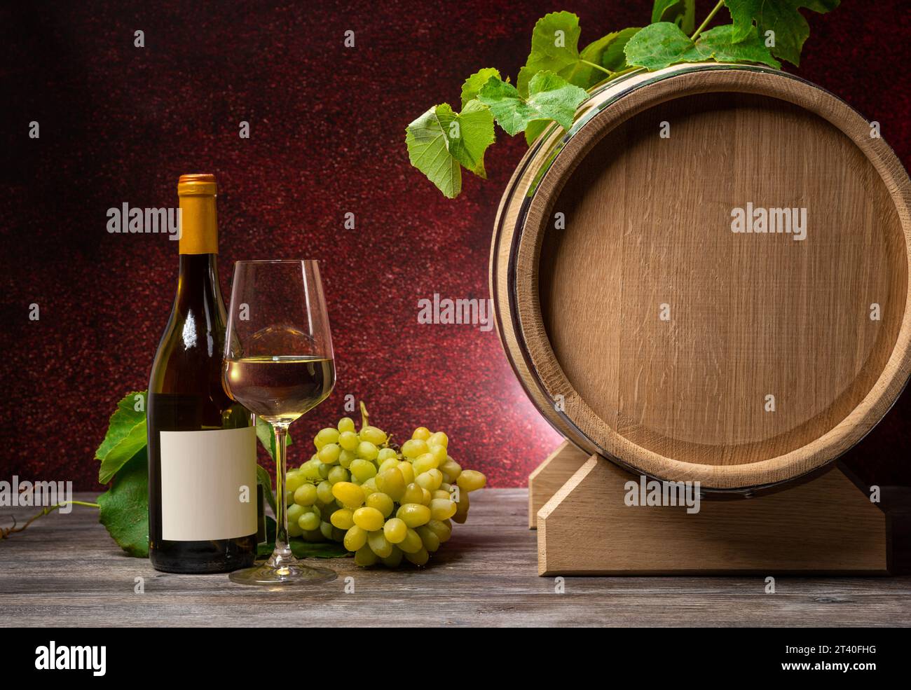 Wine tasting background, oak cask, wine bottle and glass of white wine ...