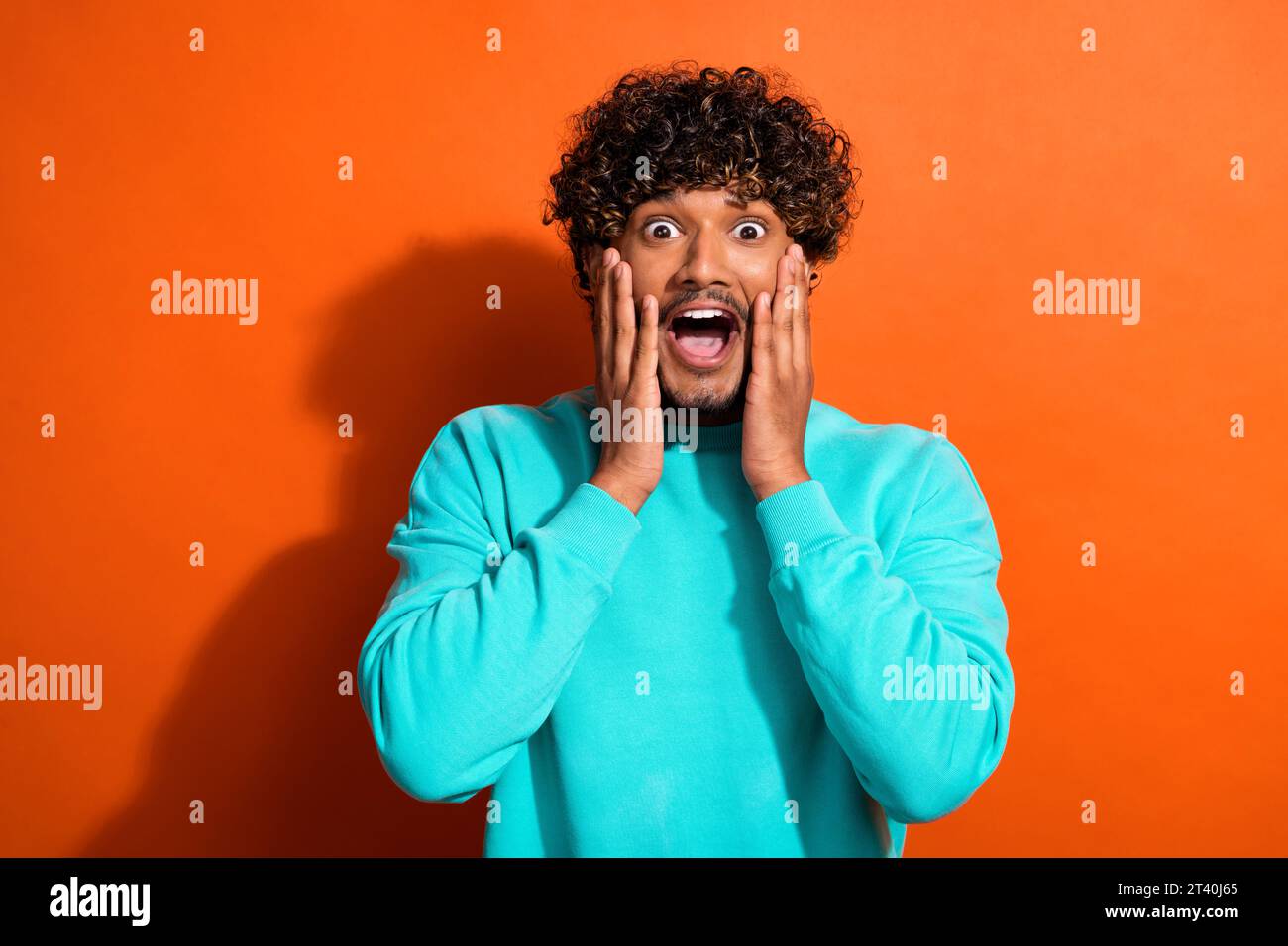 Photo of speechless impressed person hands touch cheeks open mouth ...