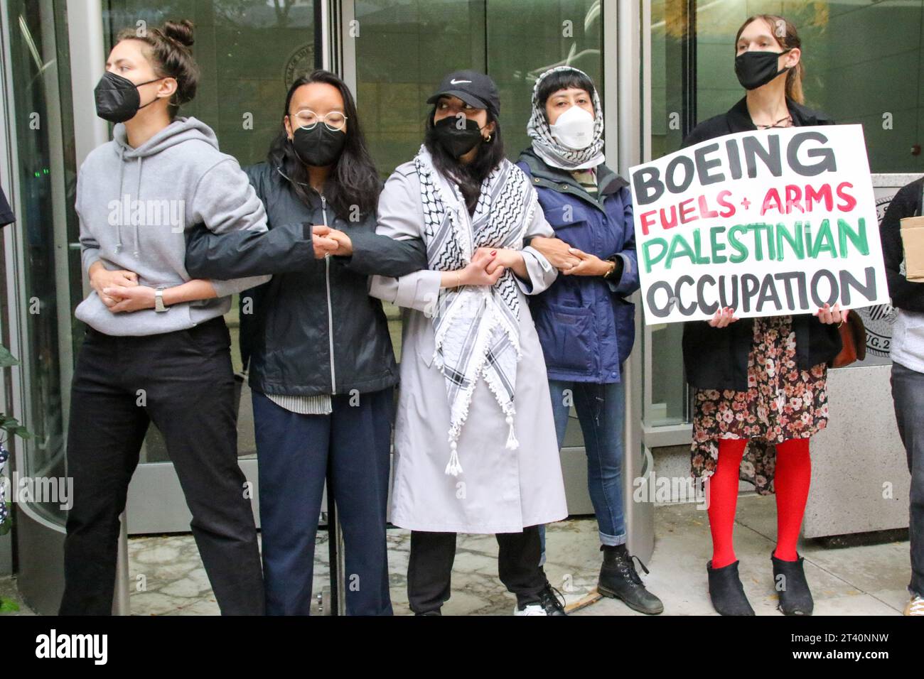 Activists attending the Boot Boeing! Free Palestine march and rally ...