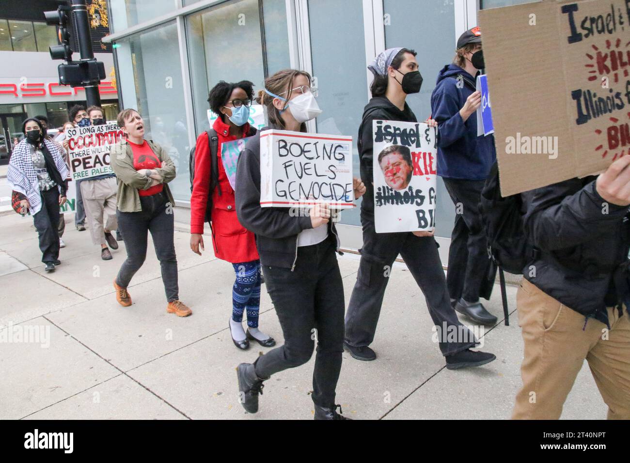 Activists attending the Boot Boeing! Free Palestine march and rally ...