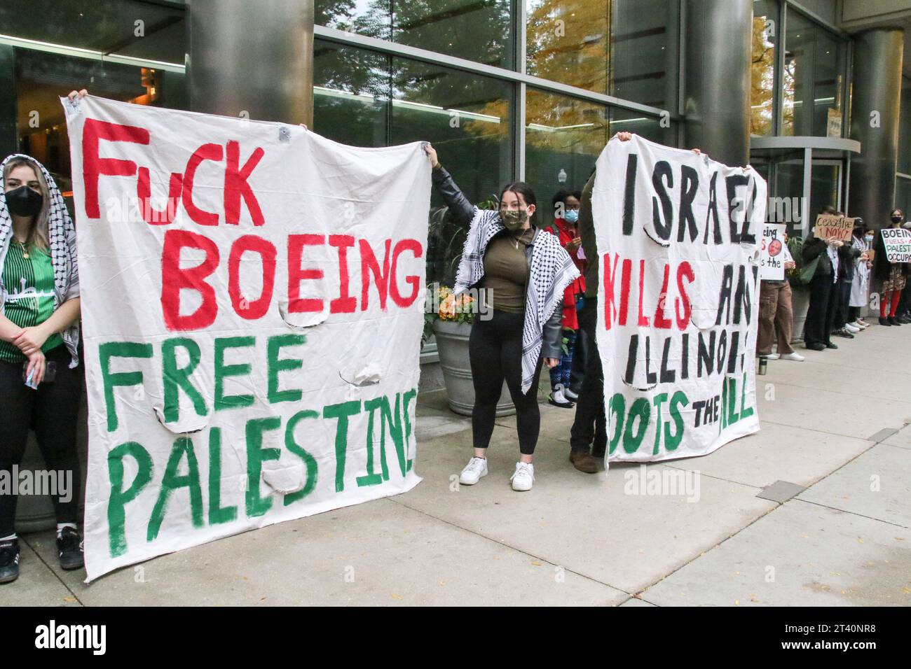 Activists attending the Boot Boeing! Free Palestine march and rally ...
