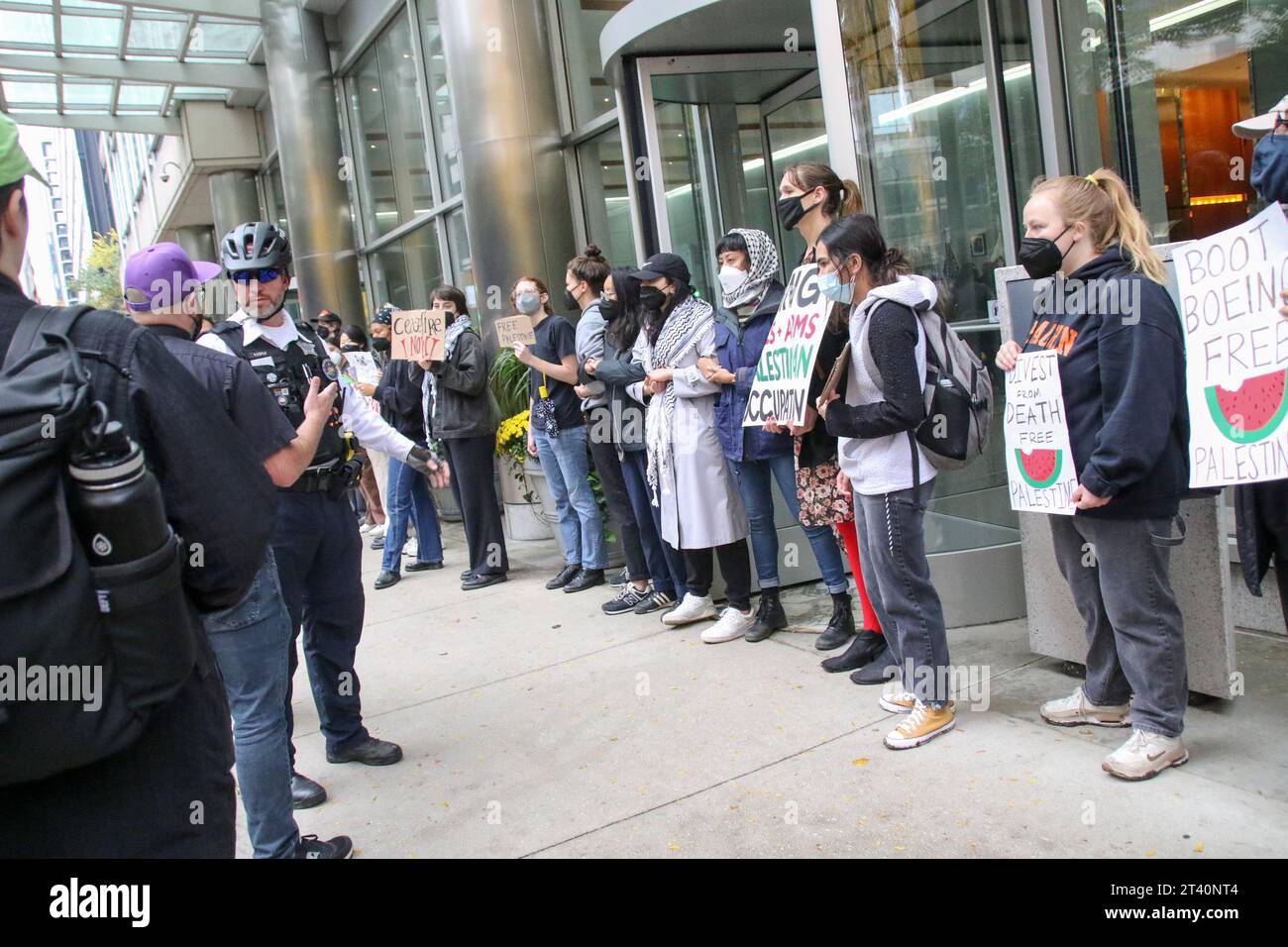 Activists attending the Boot Boeing! Free Palestine march and rally ...
