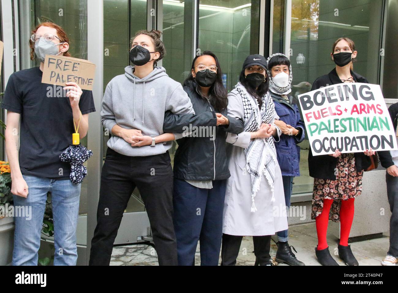 Activists attending the Boot Boeing! Free Palestine march and rally ...