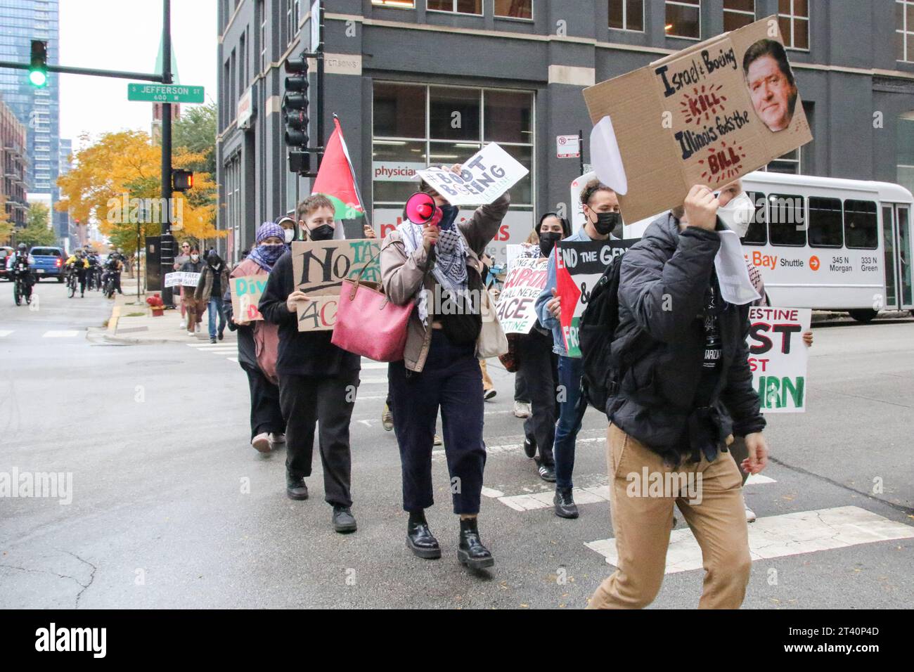 Activists attending the Boot Boeing! Free Palestine rally chant as they ...