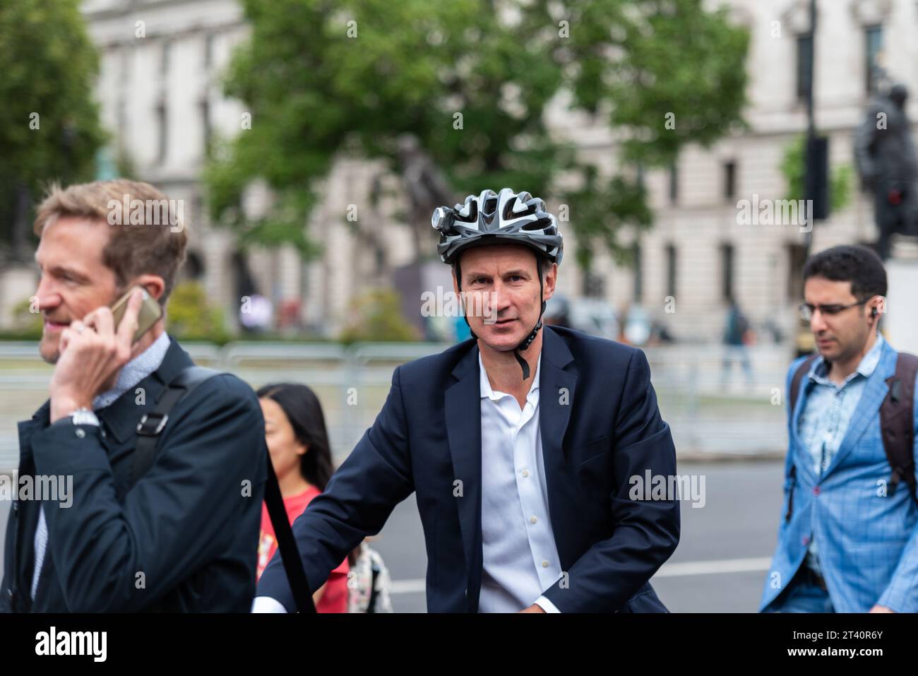Jeremy Hunt MP, Tory MP, arriving at Parliament by bicycle as ...