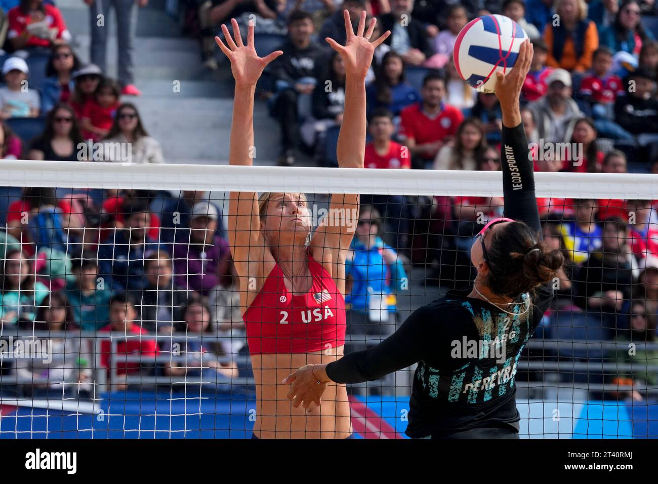 Sarah Murphy of the United States, left, tries to block a shot by ...