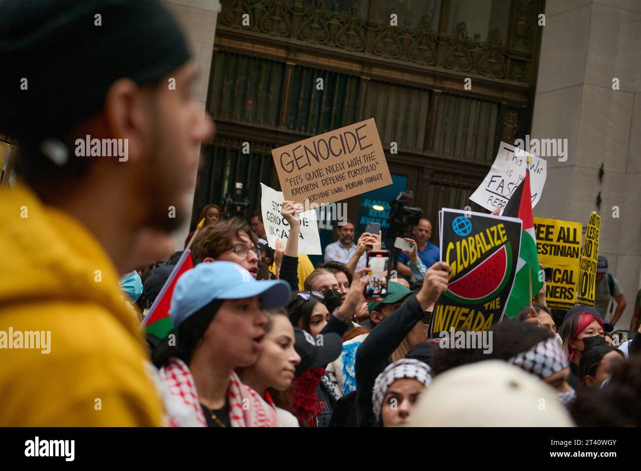 New York, New York, USA. 26th Oct, 2023. Protesters hold up signs at ...