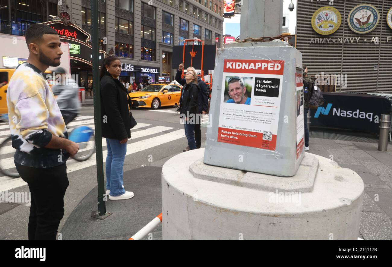 New York, New York, USA. 27th Oct, 2023. A man reads the ""˜Kidnapped ...