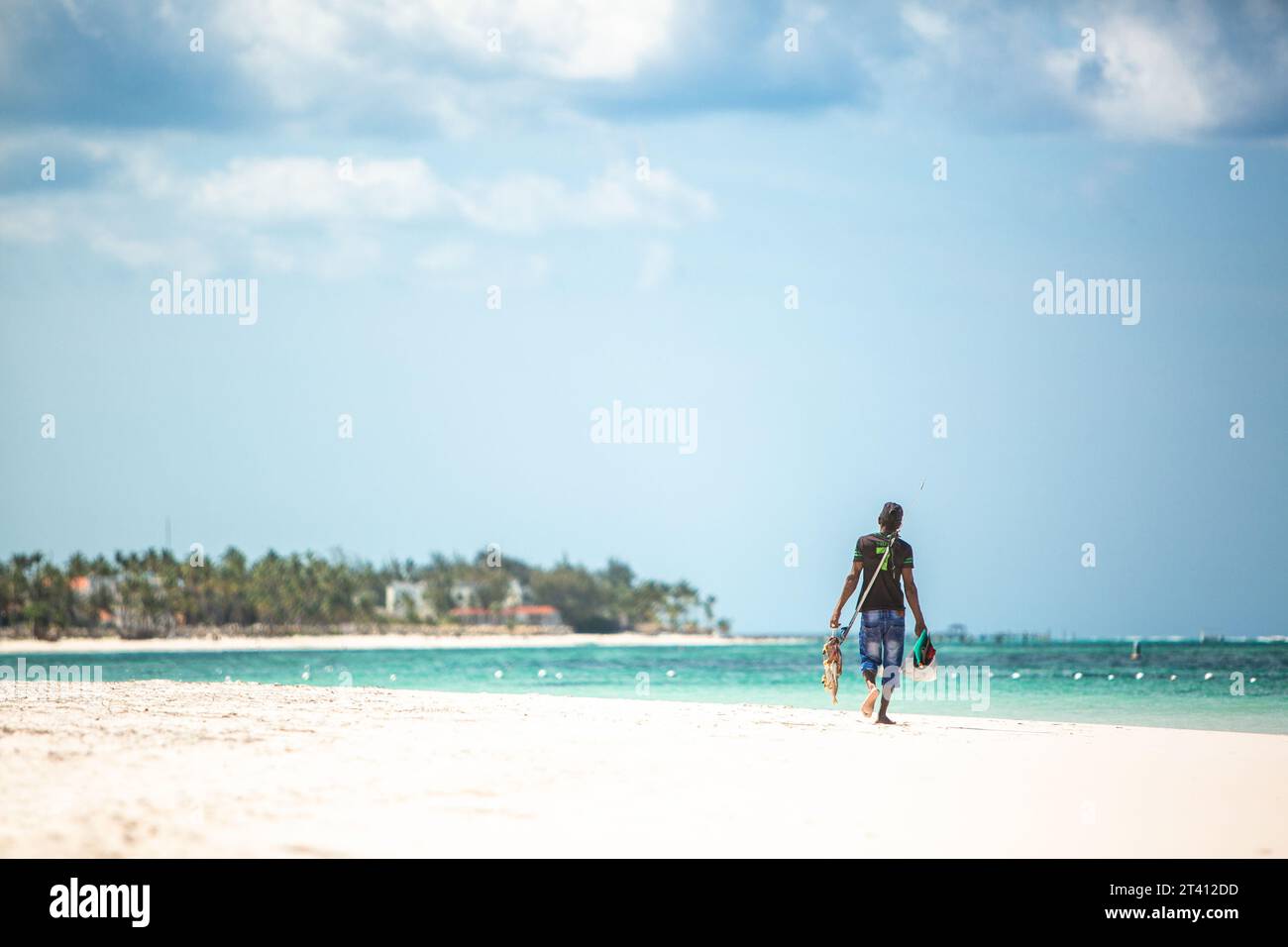 A fisherman sells fresh fish on a tropical beach. The life of the local ...