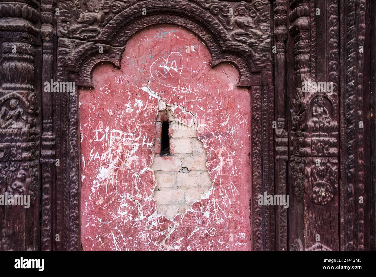 Wall with details of traditional Nepalese temple in The centrum of ...