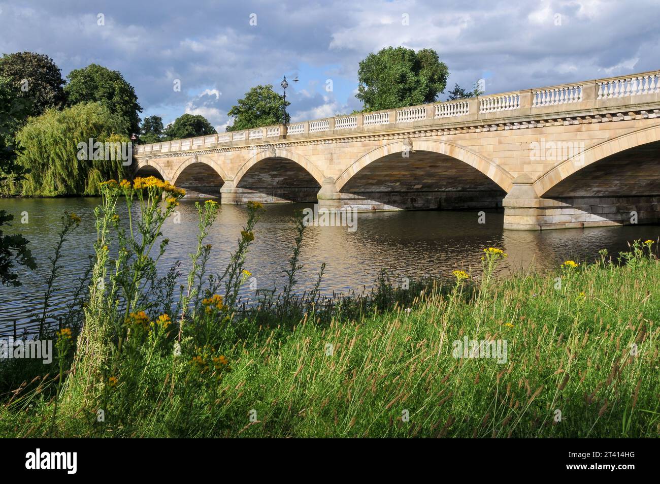 Under the afternoon sun, the Serpentine Bridge graces Hyde Park in ...