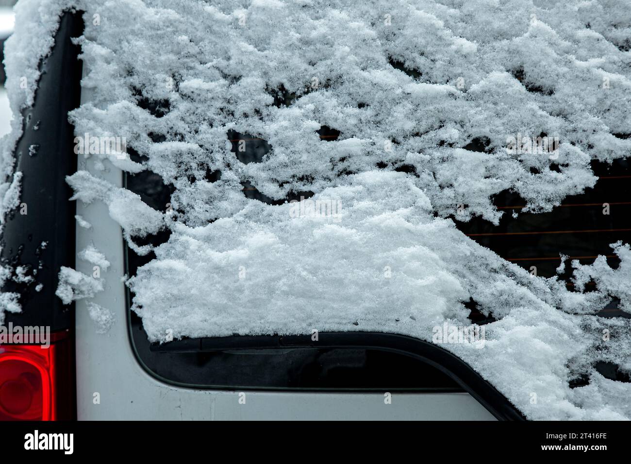 station wagon rear view of the rear window with a windshield wiper ...