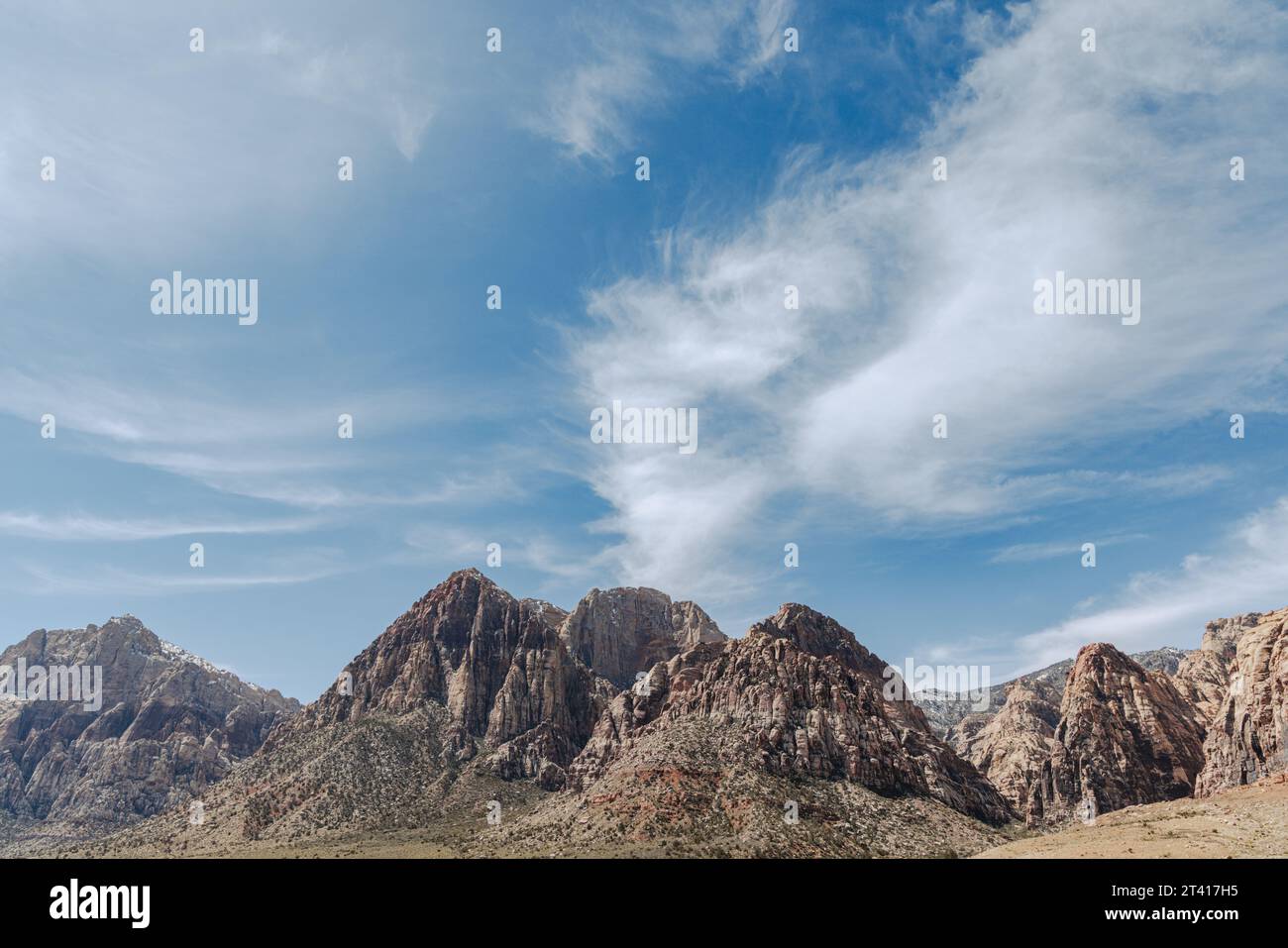 Wispy white cloud in blue sky above Red Rock Canyon National ...