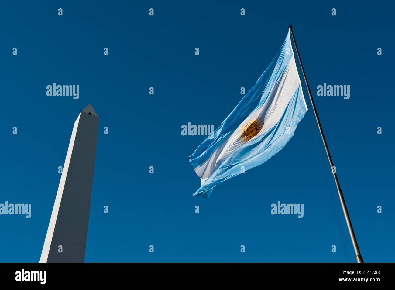 Argentina, Buenos Aires, Argentine flag and Obelisk Stock Photo - Alamy