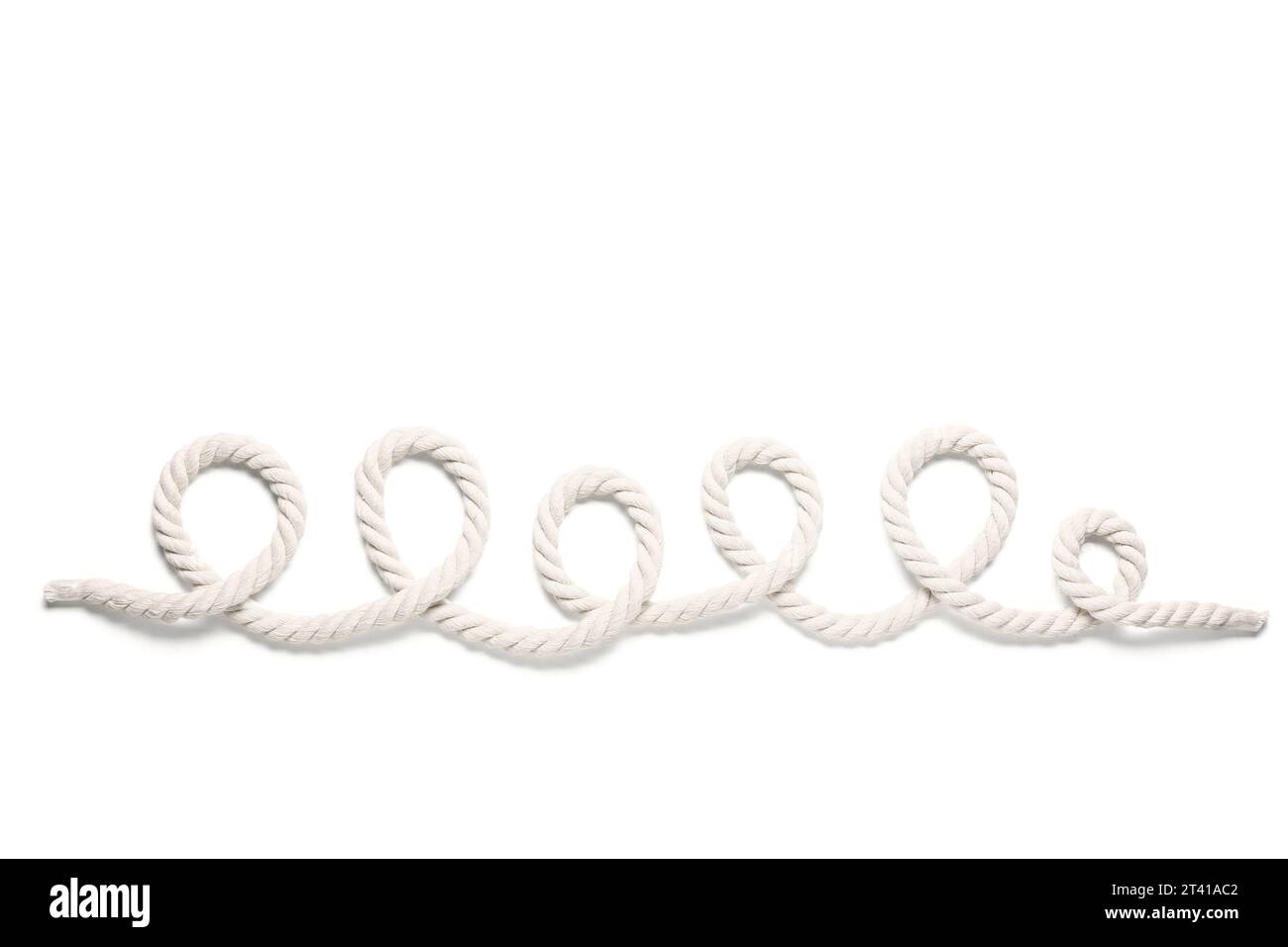 Long rope on white background Stock Photo - Alamy