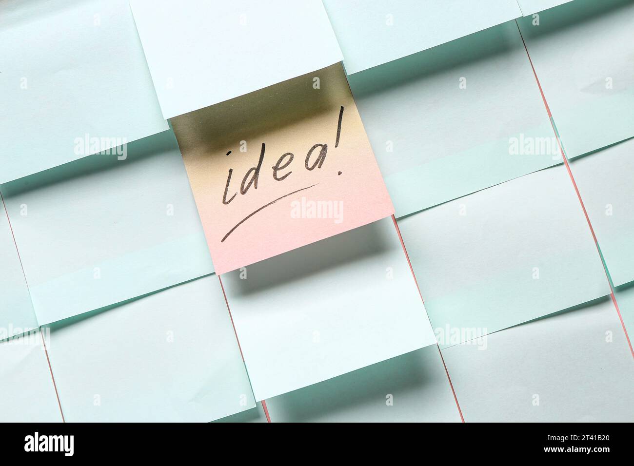 Sticky notes and sheet with word IDEA as background. Business idea ...