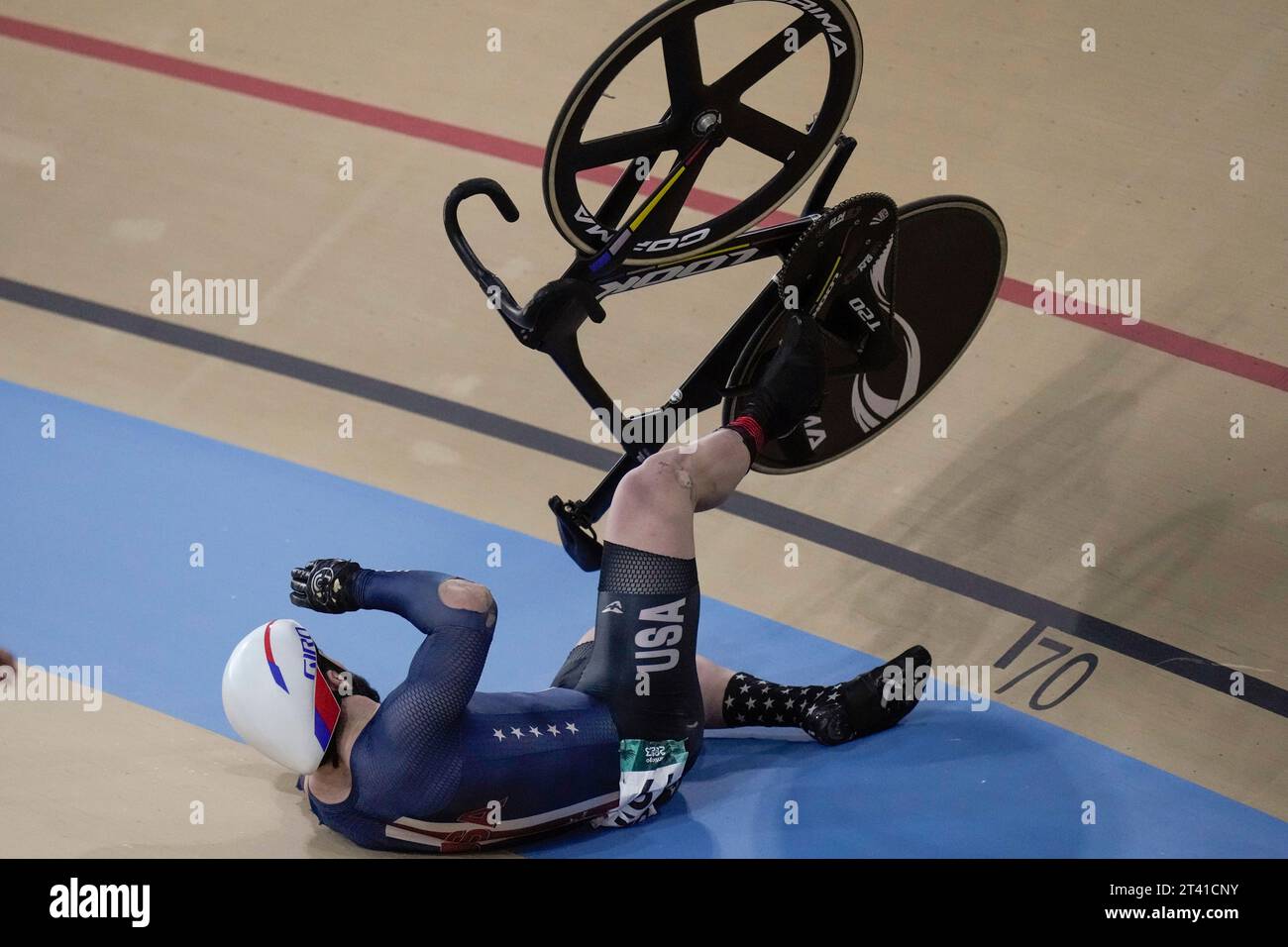 Evan Boone of the United States wipes out during the cycling track men ...