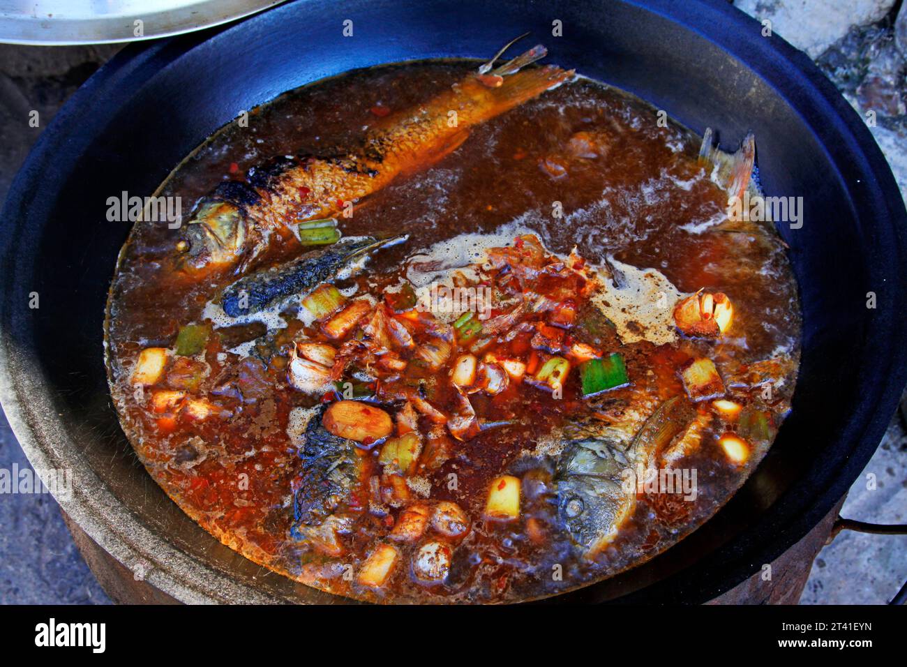 Chinese cuisine cooking - Large pot stewed fish in a restaurant Stock ...
