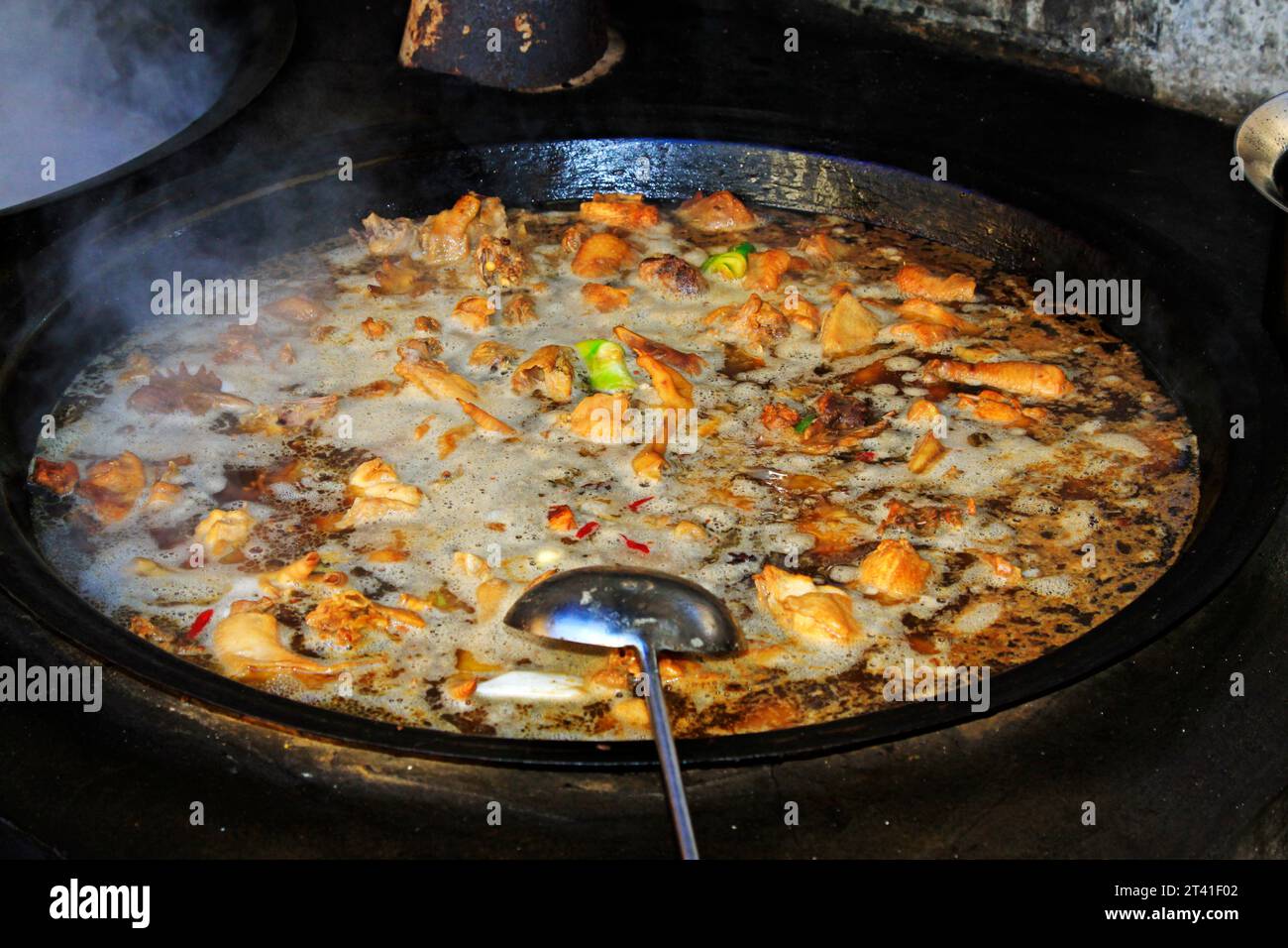 Chinese cuisine cooking - large pot of stew in a restaurant Stock Photo ...