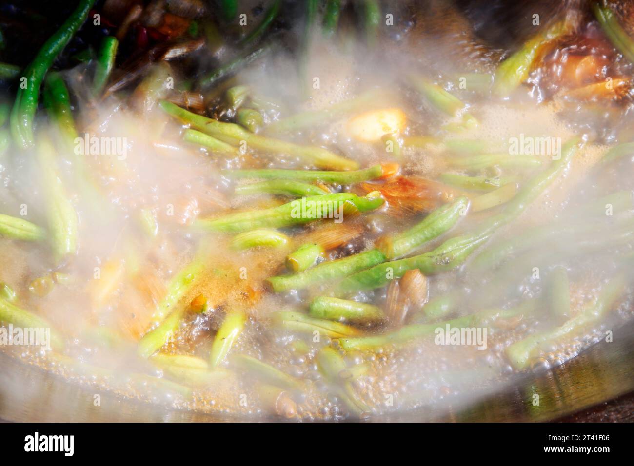 Chinese cuisine cooking - Large pot stewed beans and meat in a ...