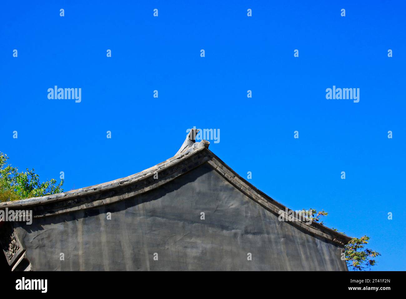 Chinese architectural style blue brick flies in the tile roof, closeup ...