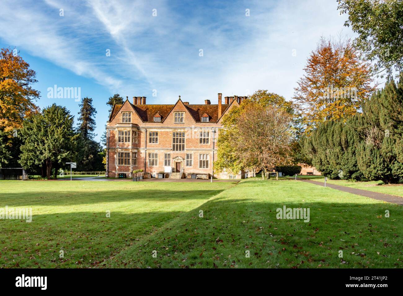 A side view of Shaw House across a green lawn in Newbury, Berkshire. An ...