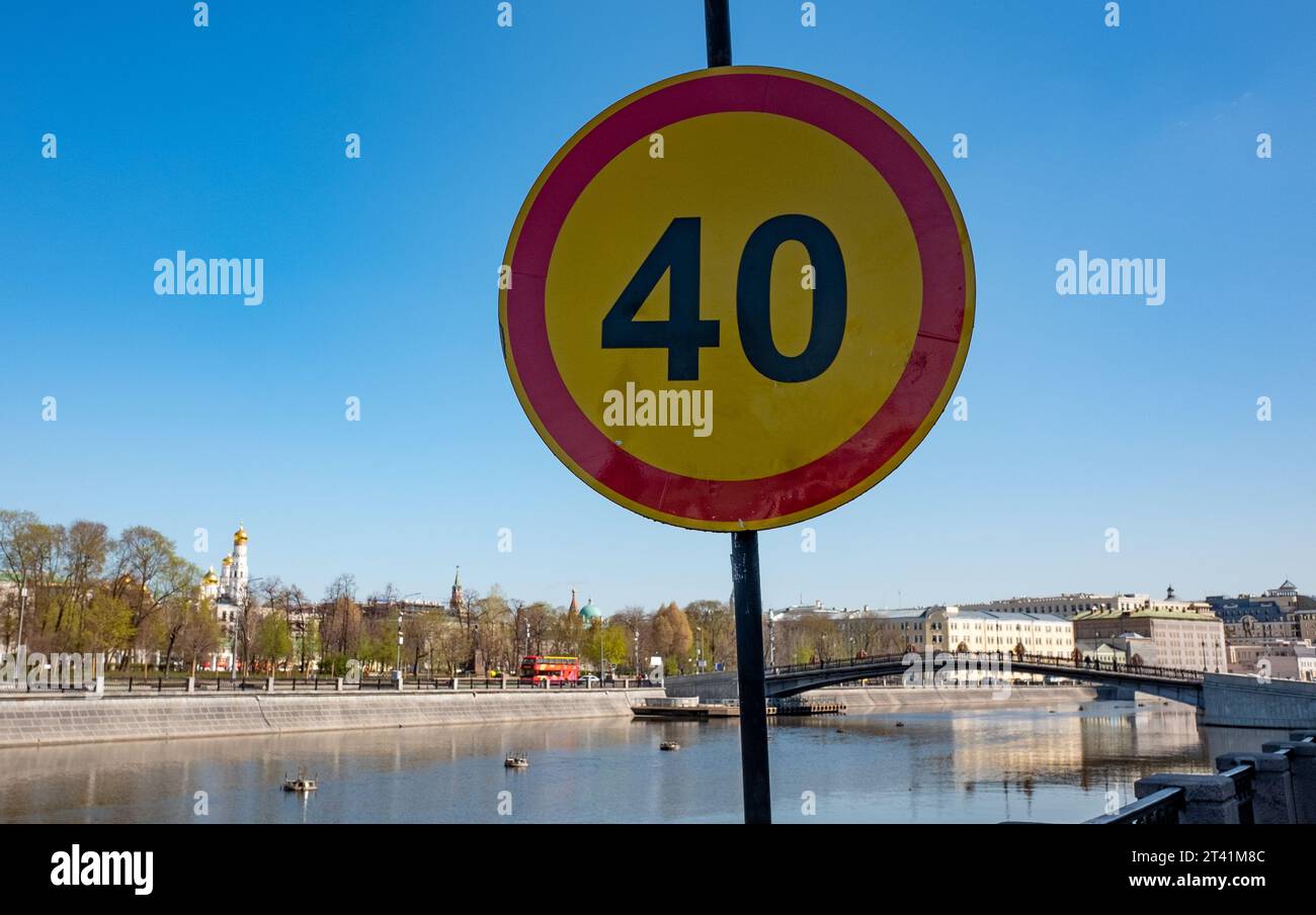 A temporary road sign limiting the maximum speed to forty kilometers ...