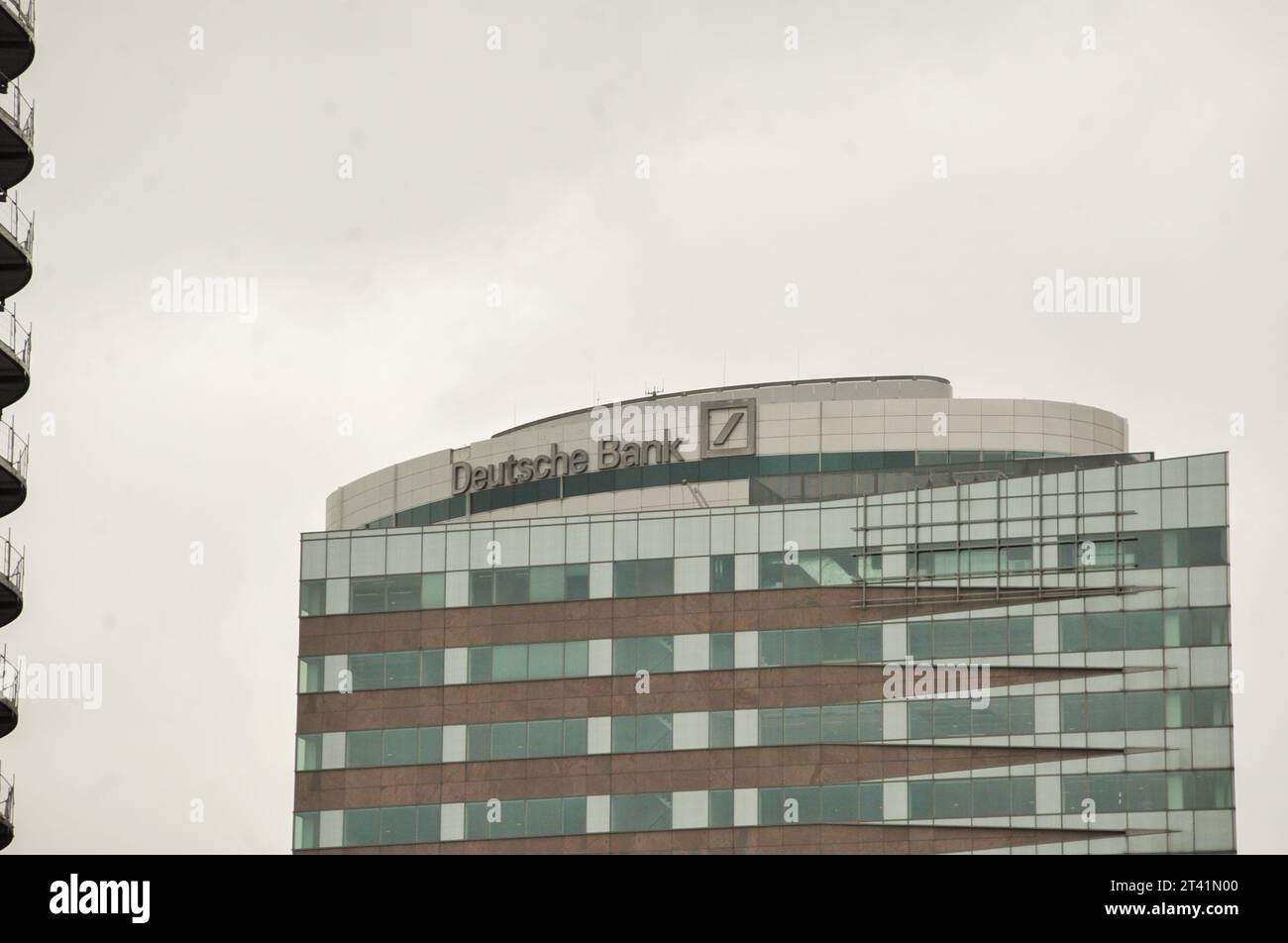 A logo sign outside of an office building of Deutsche Bank in Amsterdam ...