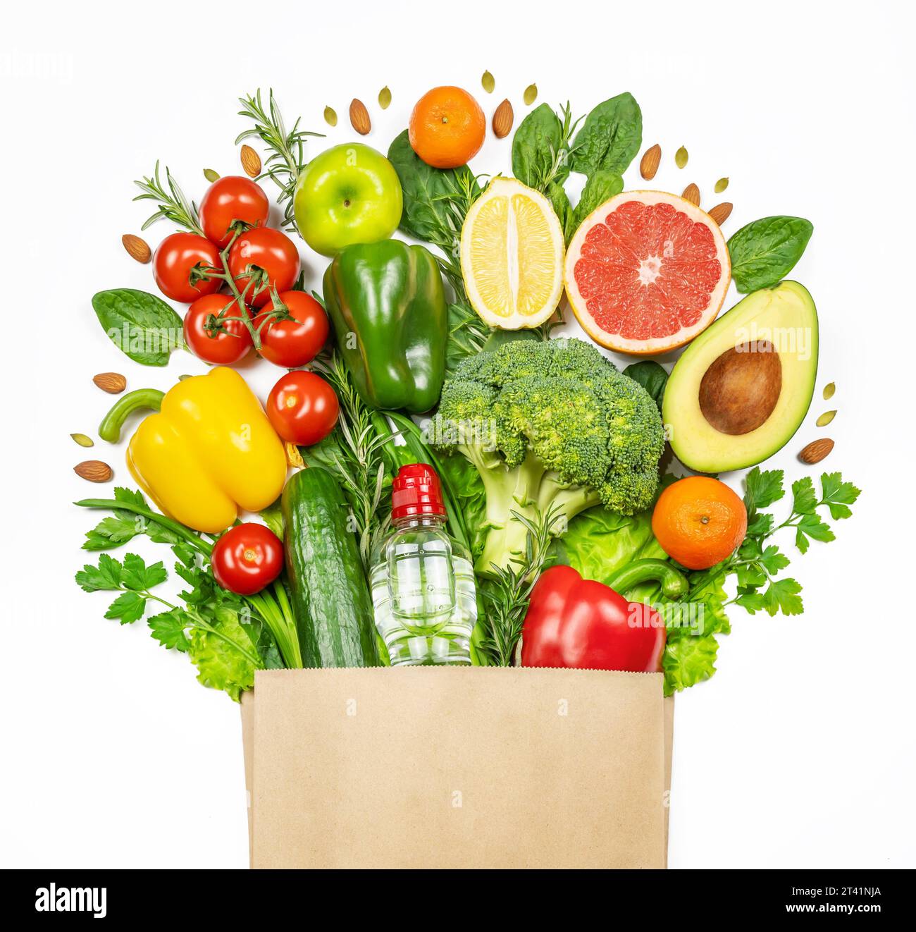 a set of healthy food in full paper bag of different products. Raw ...