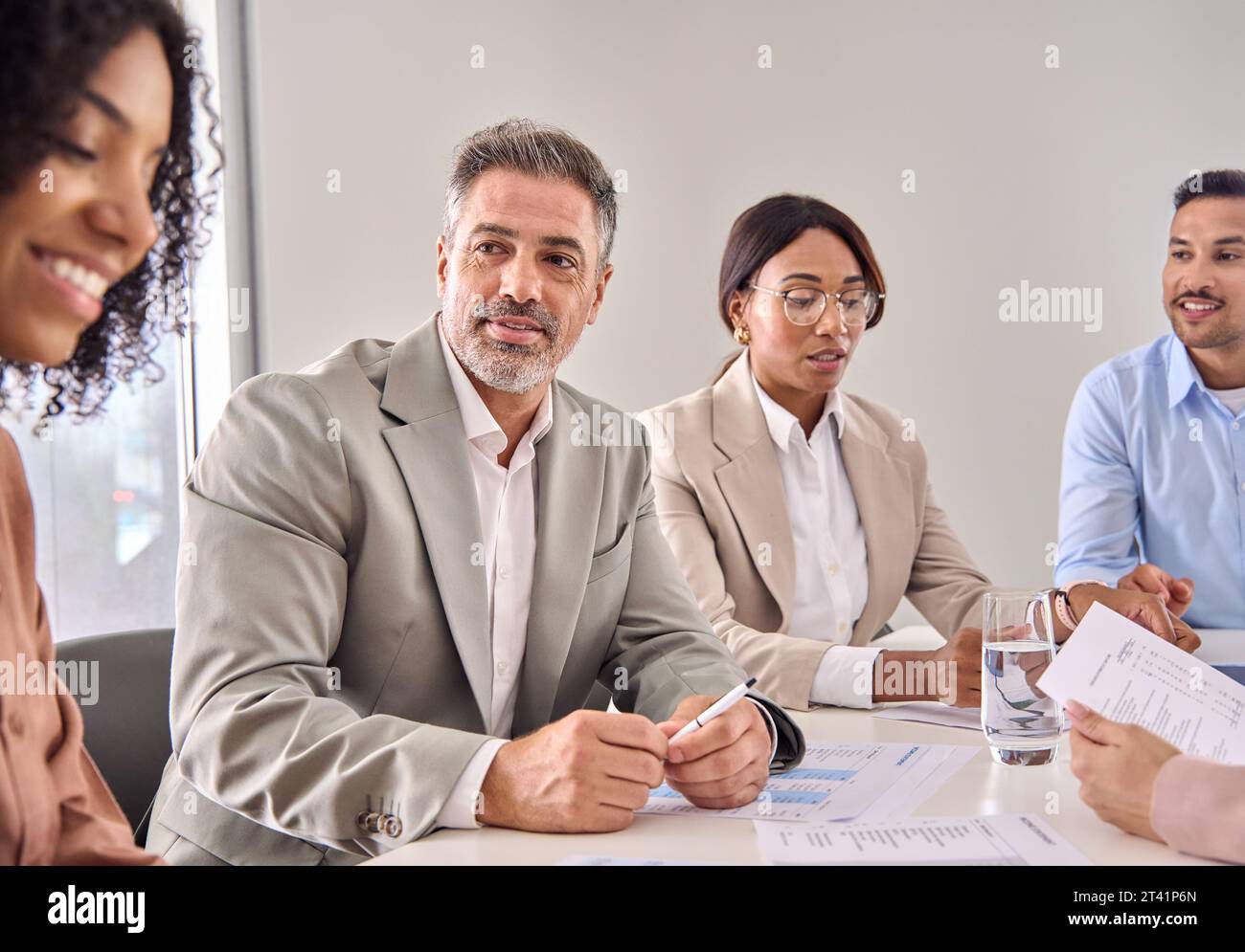 Happy busy international business team talking at office corporate ...