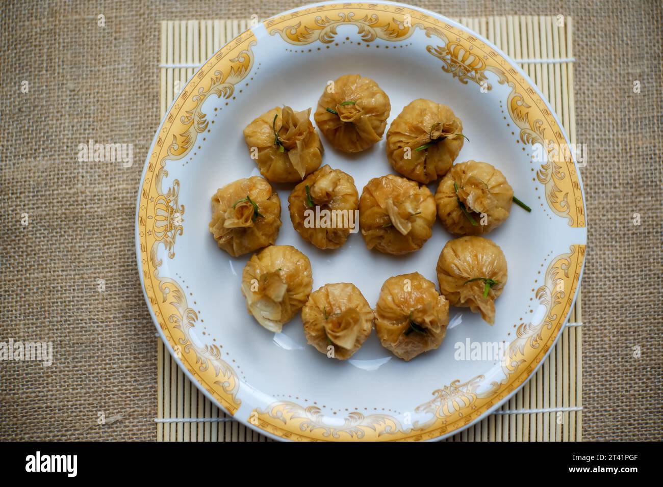 Homemade EKado snacks, flat plates ready to be served Stock Photo - Alamy