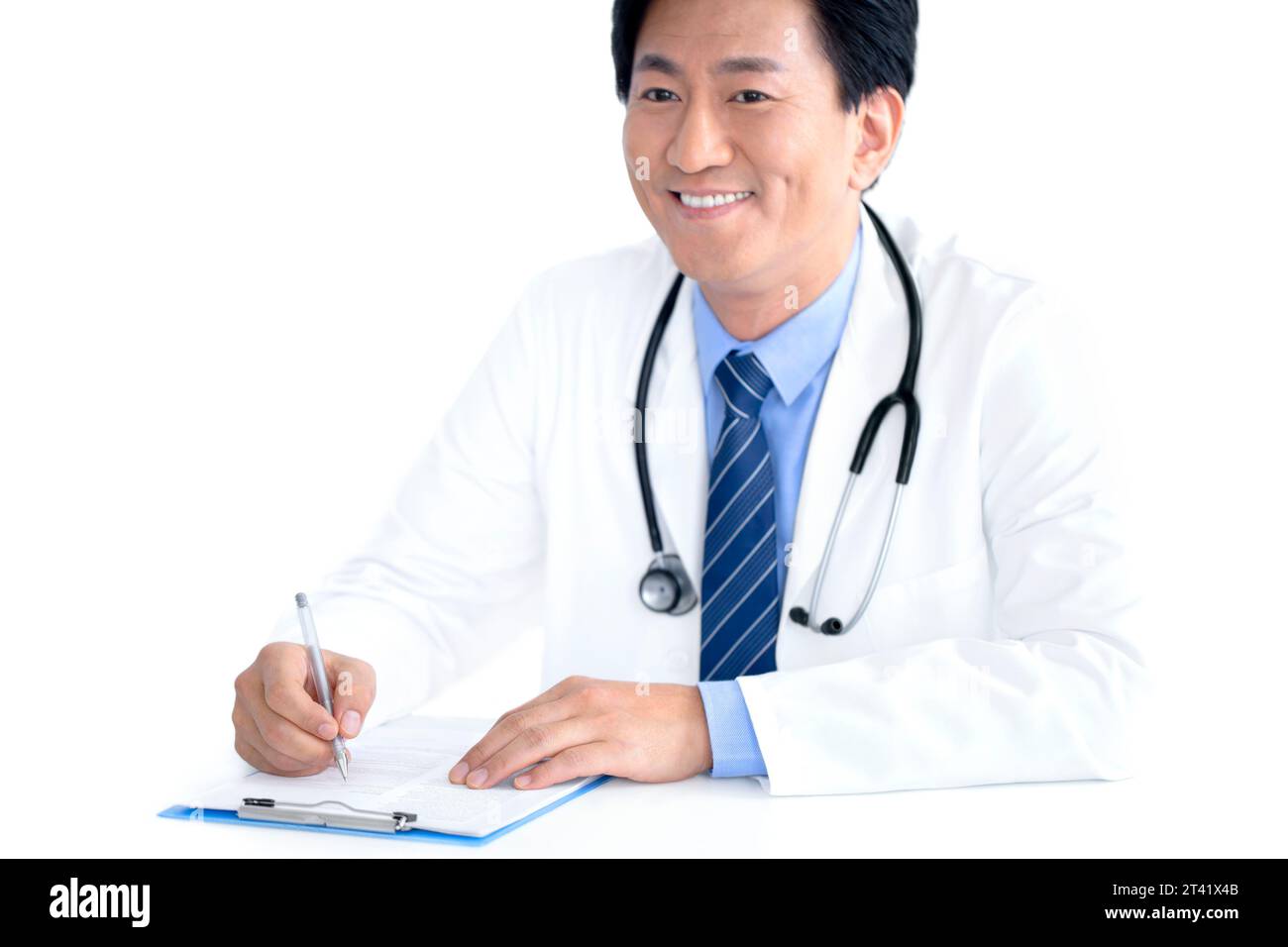 Smiling medical doctor writing hi-res stock photography and images - Alamy