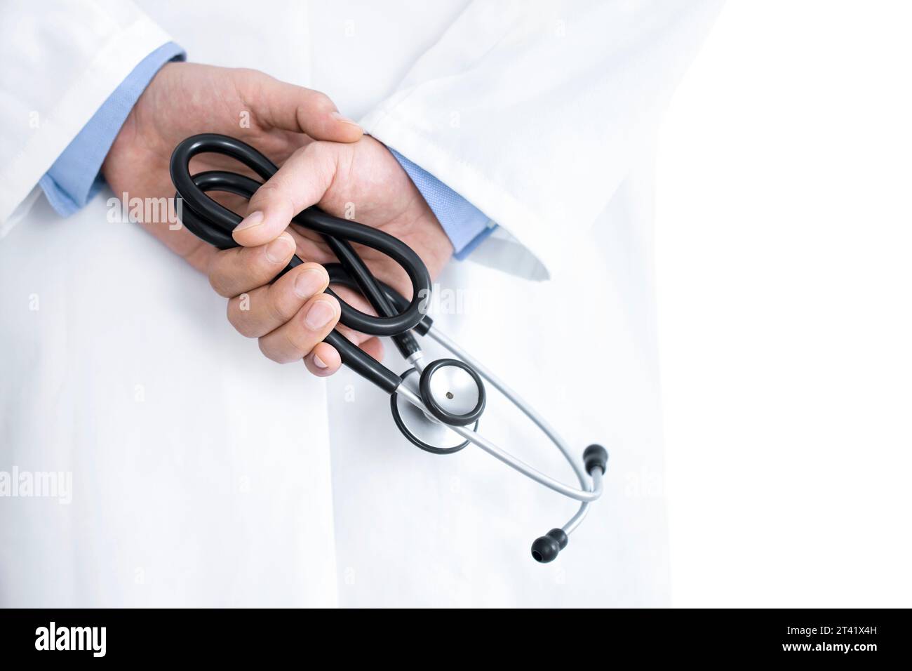 Doctor holding stethoscope Stock Photo - Alamy