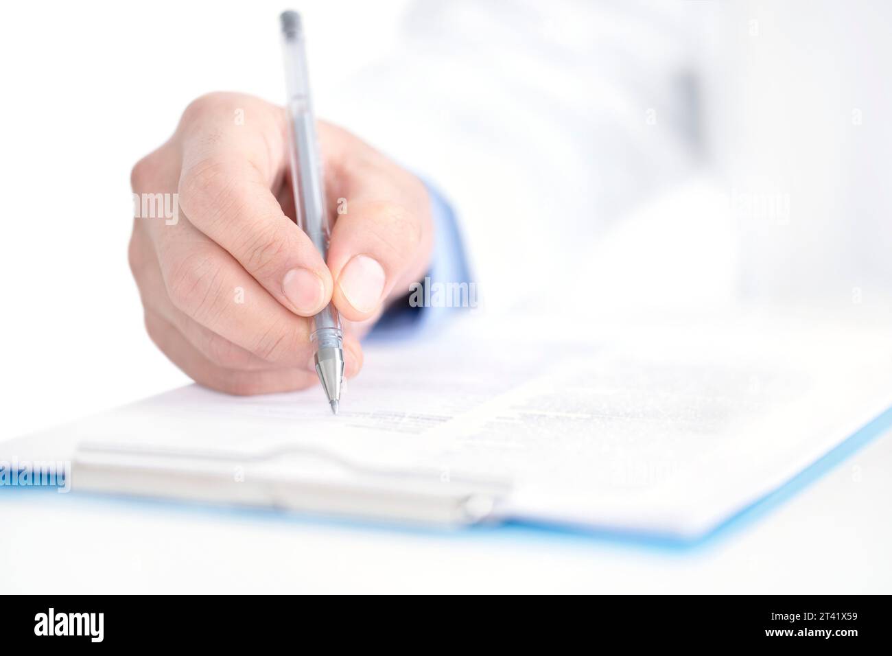 Doctor taking notes Stock Photo - Alamy