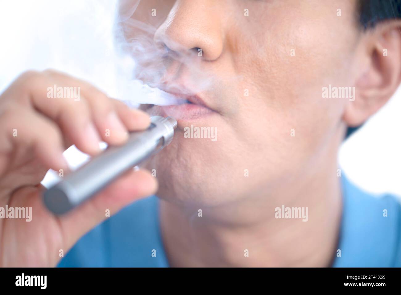 Asian man vaping hi-res stock photography and images - Alamy