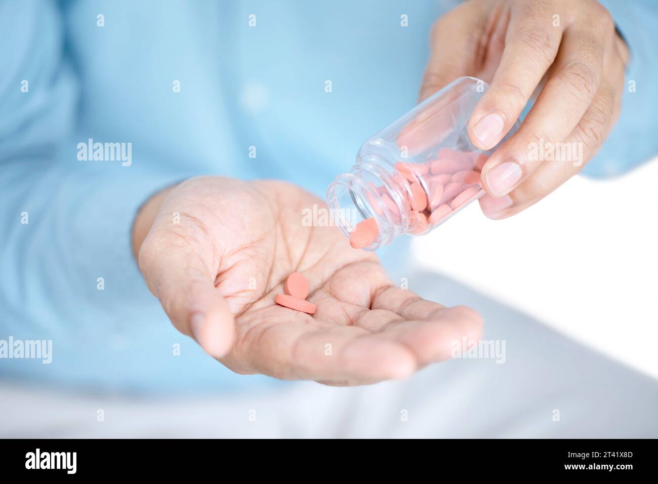 Hand bottle man hi-res stock photography and images - Alamy