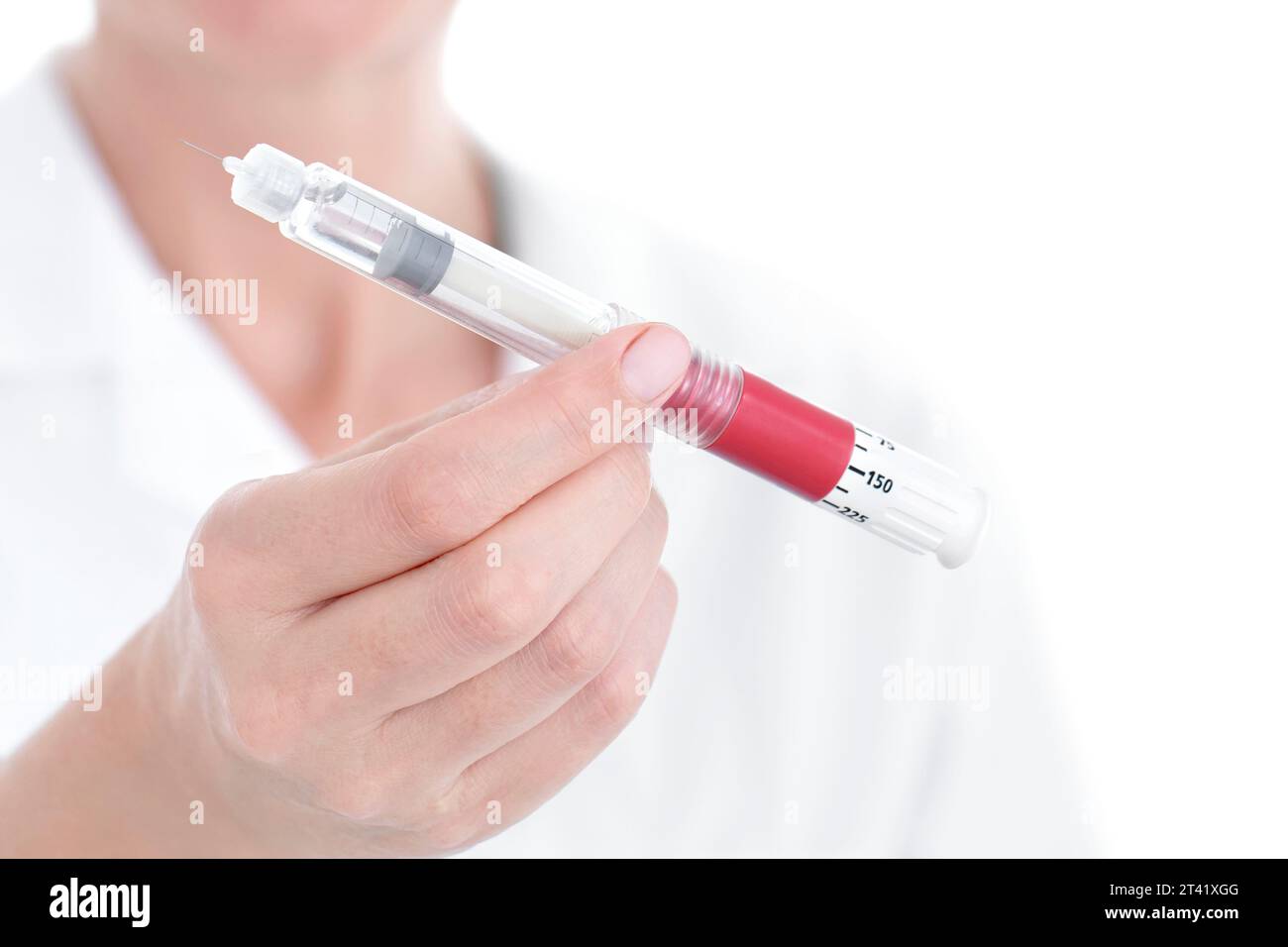 Doctor with autoinjector Stock Photo - Alamy