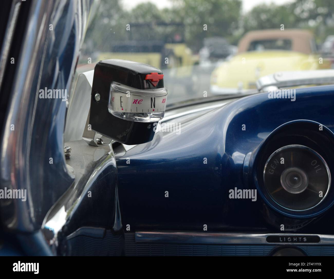 A close-up of a car dashboard showing an emergency warning sign ...