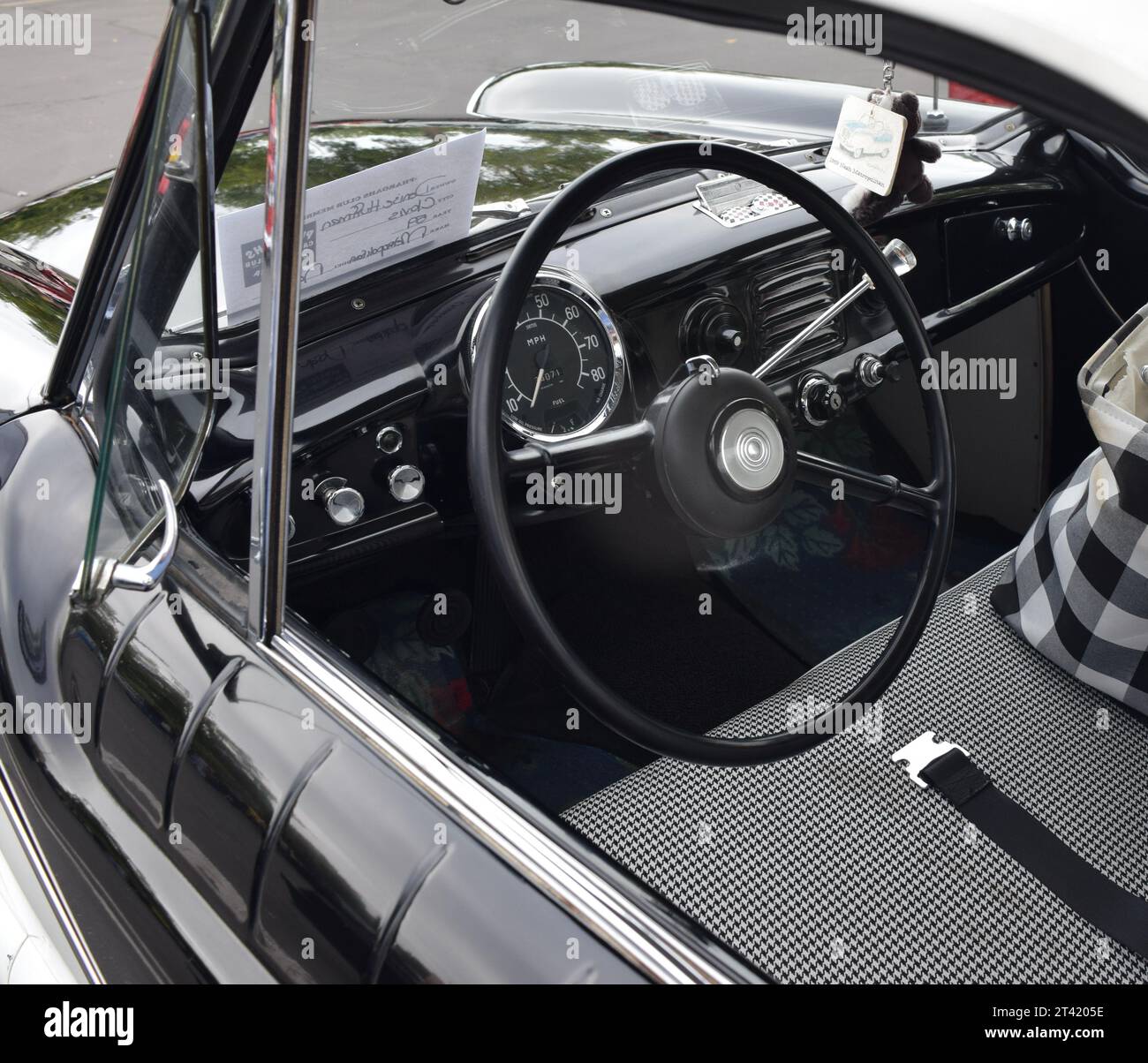 An interior view of a classic NASH blackened white Interior car ...